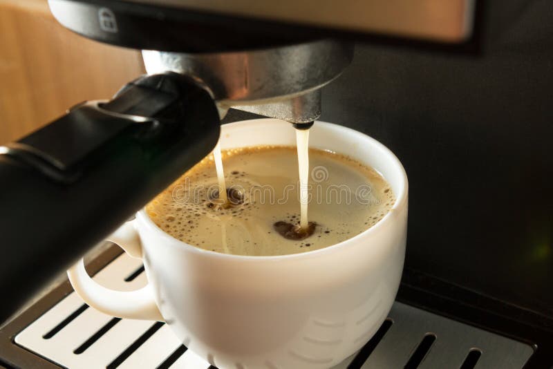 Freshly Made Coffee in a White Cup. Stock Photo - Image of machine ...