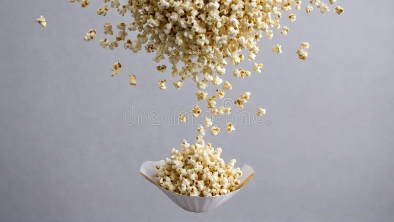 Freshly Made Crispy Popcorn Fall in Pile into Paper Cup on Gray ...