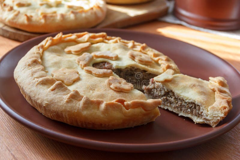 Freshly Made Homemade Meat Pie Stock Photo - Image of board, piece ...