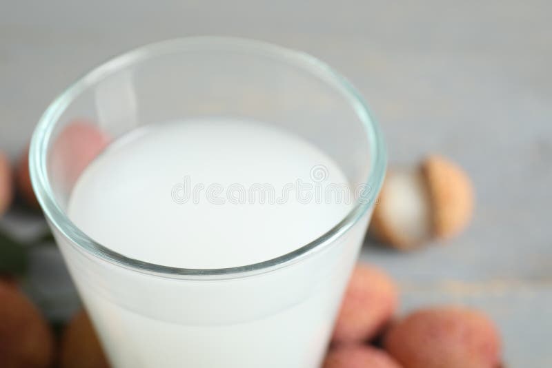 Freshly Made Lychee Juice on Grey Table, Closeup Stock Photo - Image of ...