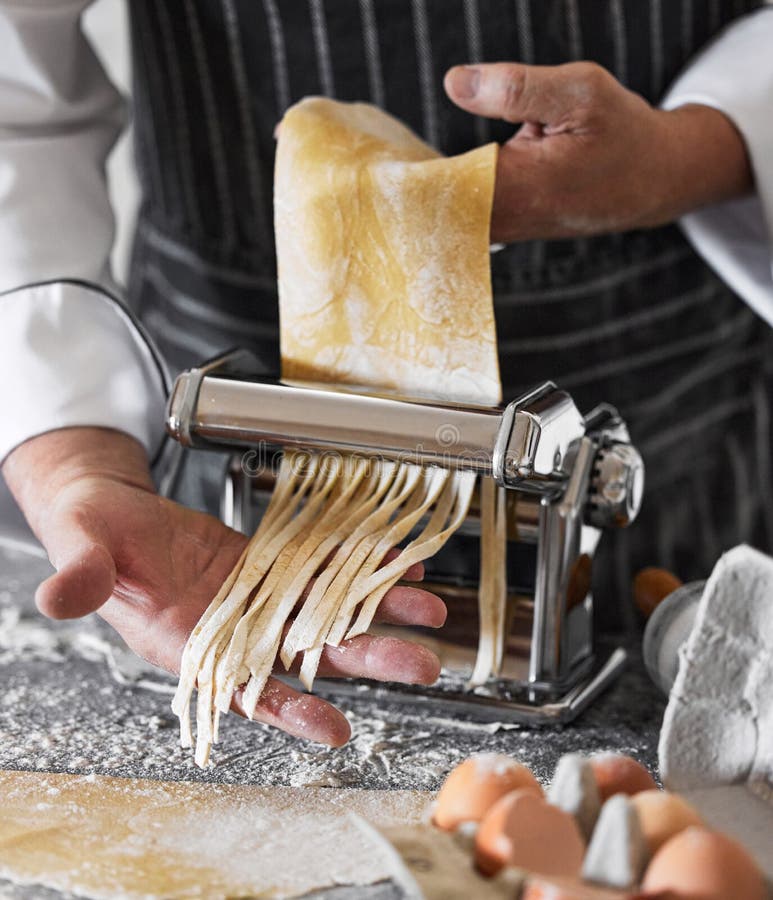 Freshly Made Pasta for Your Pleasure. an Unrecognisable Man Preparing ...