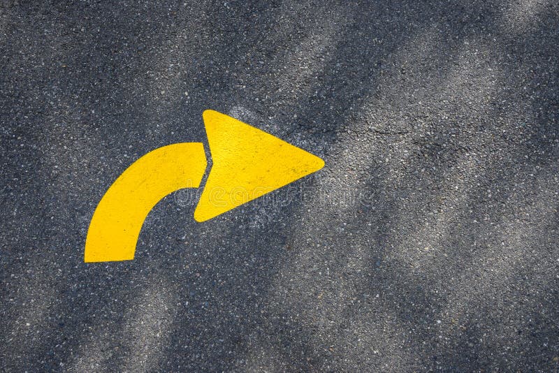 Freshly Painted Yellow Arrows on Asphalt for Driving Directions Stock ...