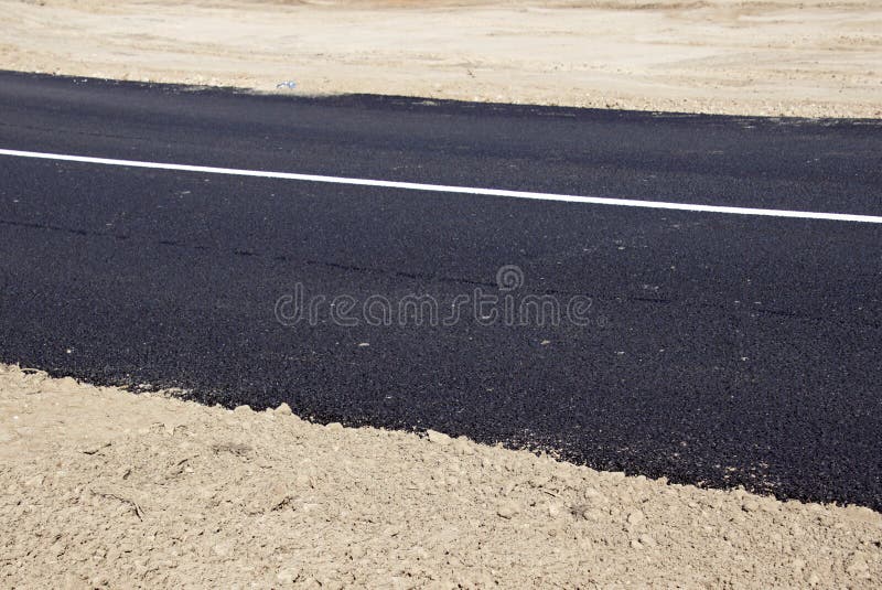 Freshly Paved Asphalt Roadway. Stock Photo - Image of sand, black ...