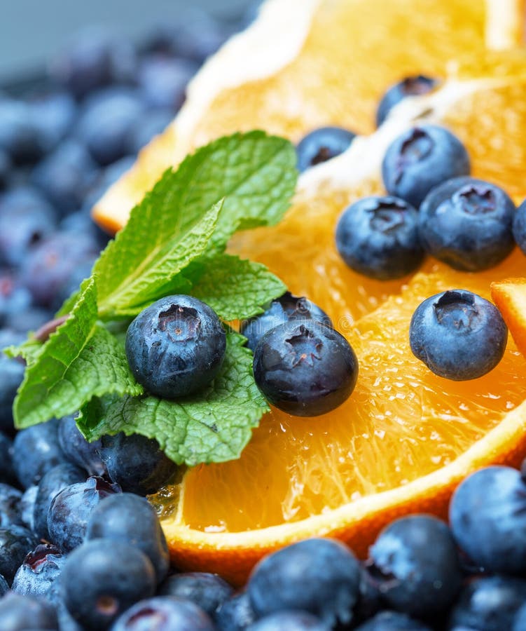 Freshly Picked Blueberries with Orange Stock Image - Image of round ...