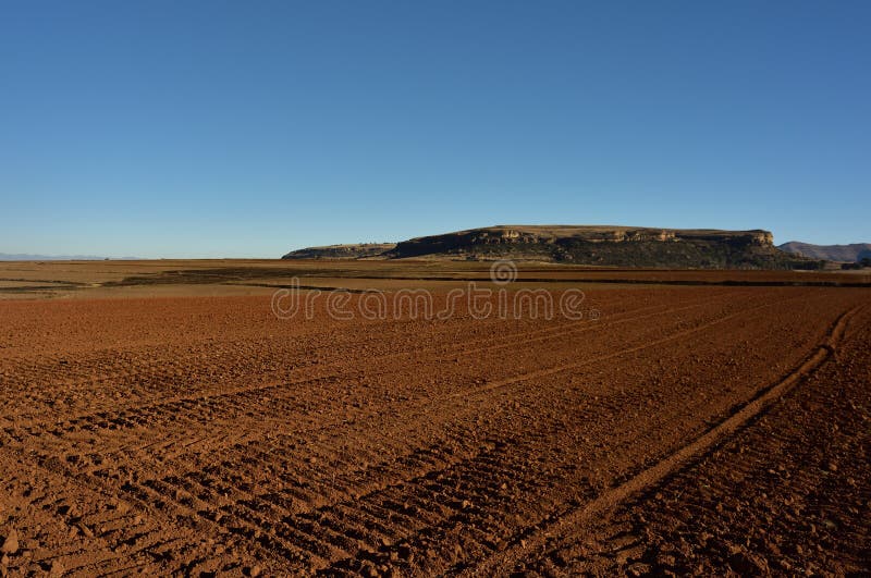 A Freshly Ploughed Farmland with a Typical Free State Sandstone Stock ...