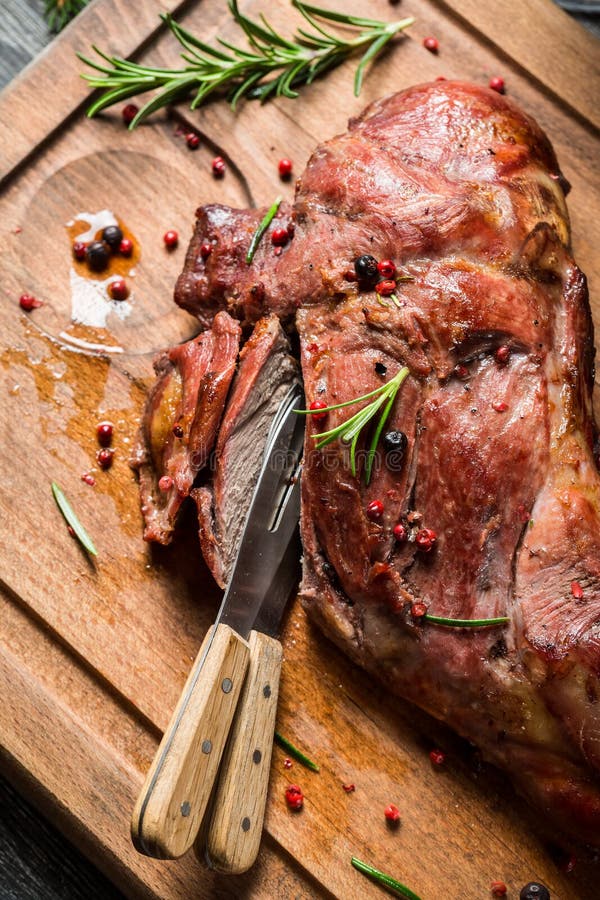 Freshly Roasted Venison with Rosemary and Pepper Stock Photo - Image of ...