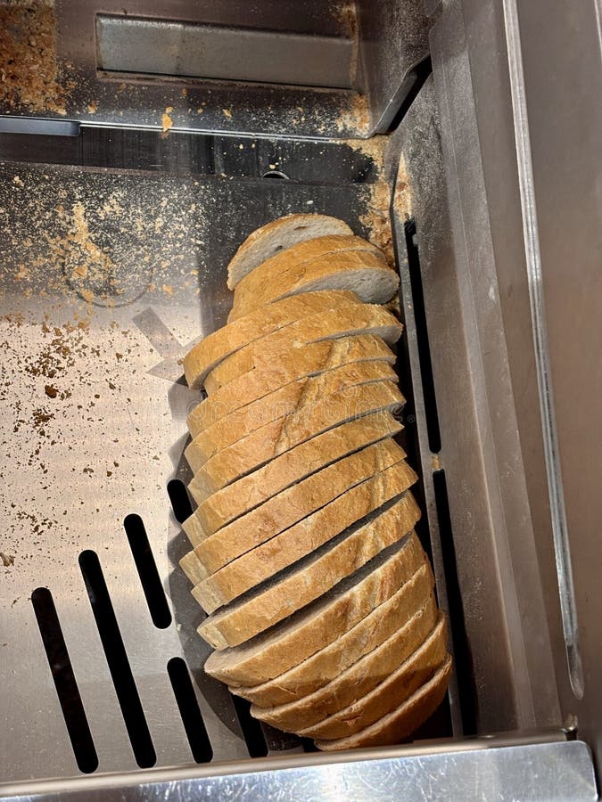 Freshly Sliced Bread Arranged in Even Layers after Being Cut with a ...
