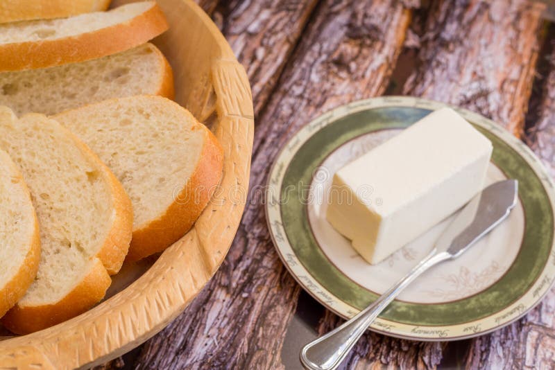 Freshly Sliced Bread Platter with Butter. Stock Photo - Image of fresh ...