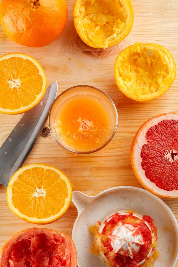 Freshly Squeezed Citrus Juice. Orange and Grapefruit Stock Photo ...