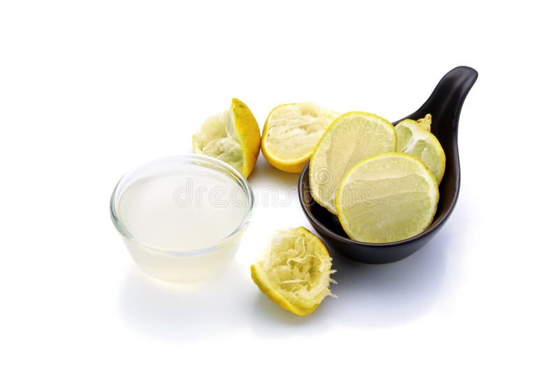 Freshly Squeezed Lemon Juice in a Small Bowl Put on White Stock Photo ...