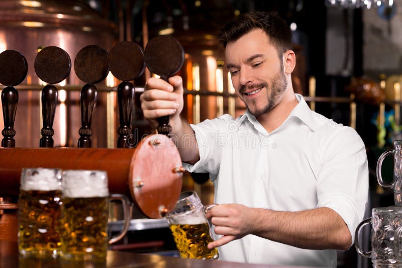Freshly tapped beer. stock image. Image of alcohol, froth - 35922517