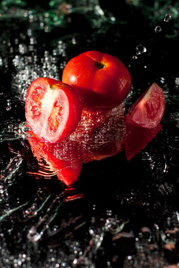 Freshly tomatoes splash stock image. Image of beverage - 10460089