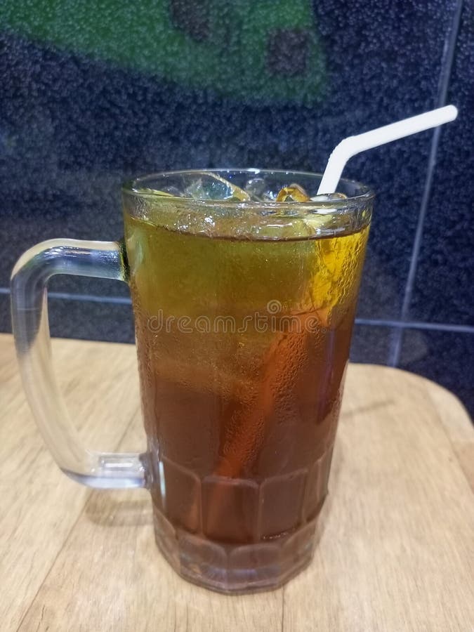 The Freshness of a Glass of Sweet Iced Tea while Enjoying Dinner Stock ...