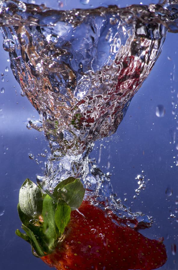 Strawberry in the water stock image. Image of organic - 30223623