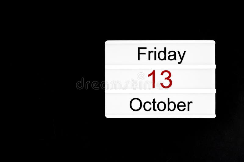 The Friday 13th October Text on White Lightbox Sitting on Black Color ...