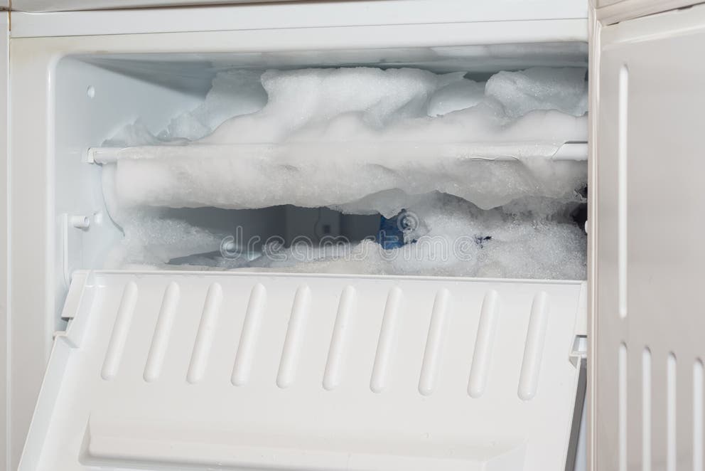 The Fridge Freezer is Covered with a Thick Layer of Ice and Snow Stock ...