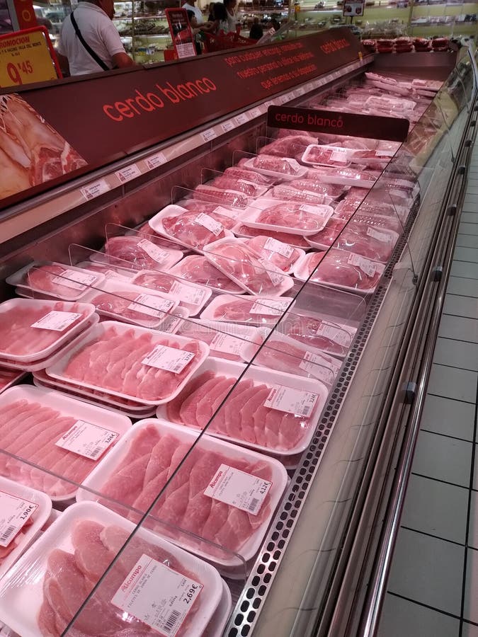 Raw Meat in Trays in the Window of a Butcher Shop. Stock Photo - Image ...