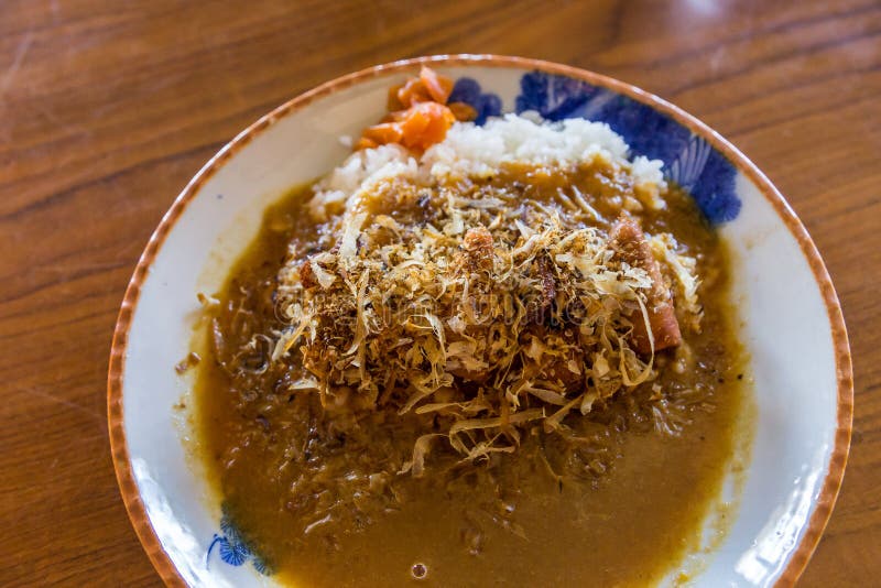 Fried Baby Octopus Curry Rice and Dried Fish. Stock Image - Image of ...