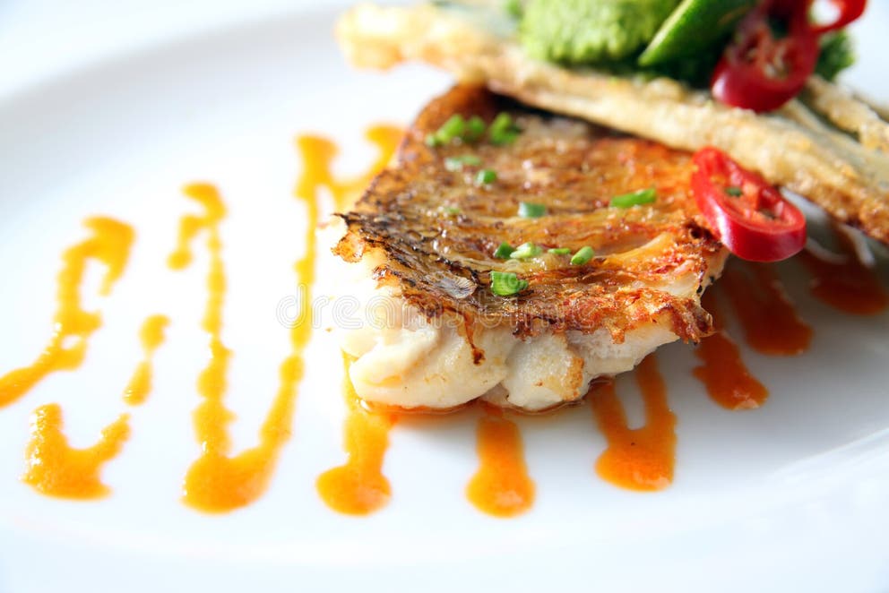 Fried baby snapper stock image. Image of studio, skin - 15391779