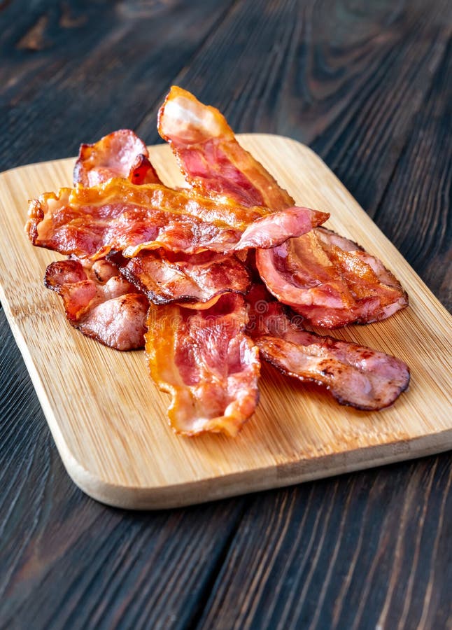 Fried Bacon on the Cutting Board Stock Photo - Image of roasted, group ...