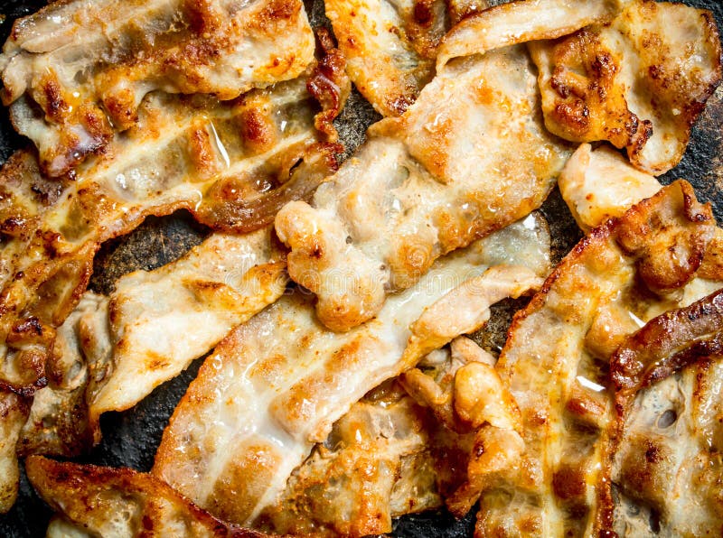 Fried Bacon in a Frying Pan Stock Photo - Image of bacon, meat: 141868498