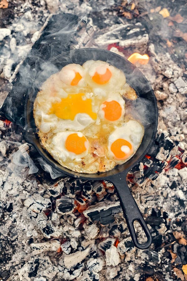 Fried Bacon in a Pan Over a Campfire in the Forest Stock Image - Image ...