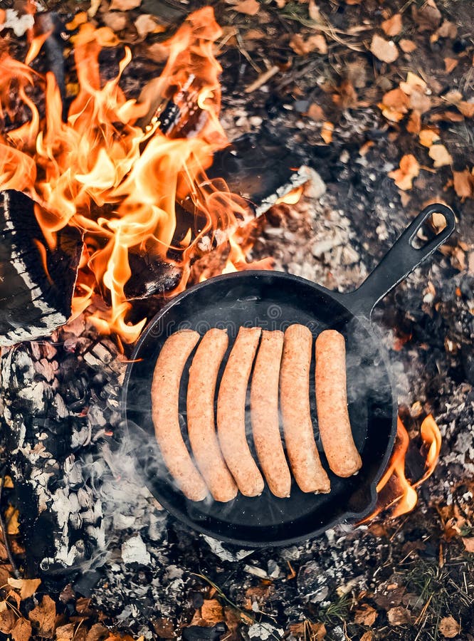 Fried Bacon in a Pan Over a Campfire in the Forest Stock Photo - Image ...