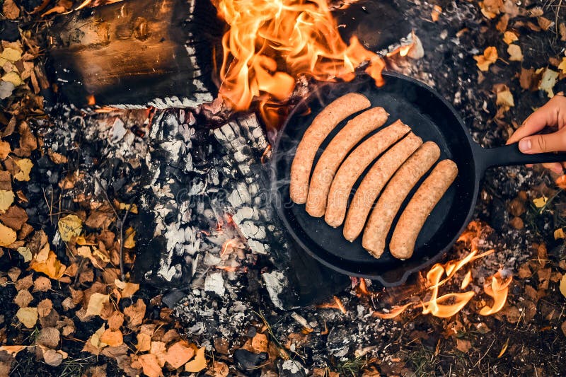 Fried Bacon in a Pan Over a Campfire in the Forest Stock Image - Image ...