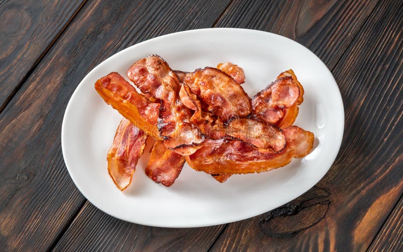 Fried Bacon on the Serving Plate Stock Image - Image of closeup, rasher ...