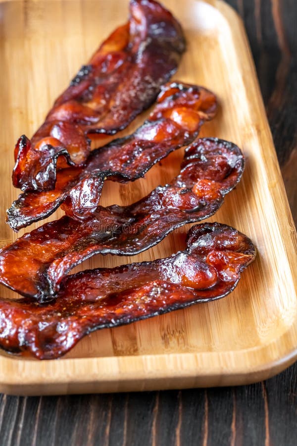 Fried bacon strips stock photo. Image of dark, cured - 264175270