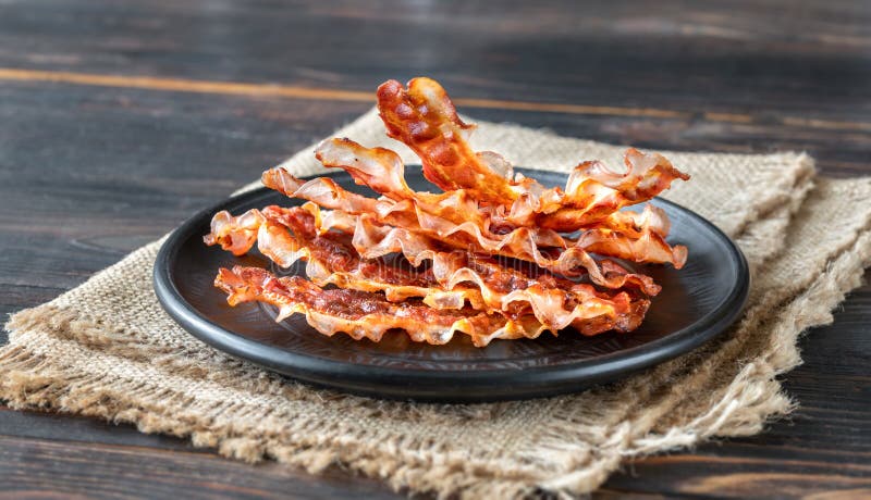 Fried bacon strips stock image. Image of delicious, cured - 181084437