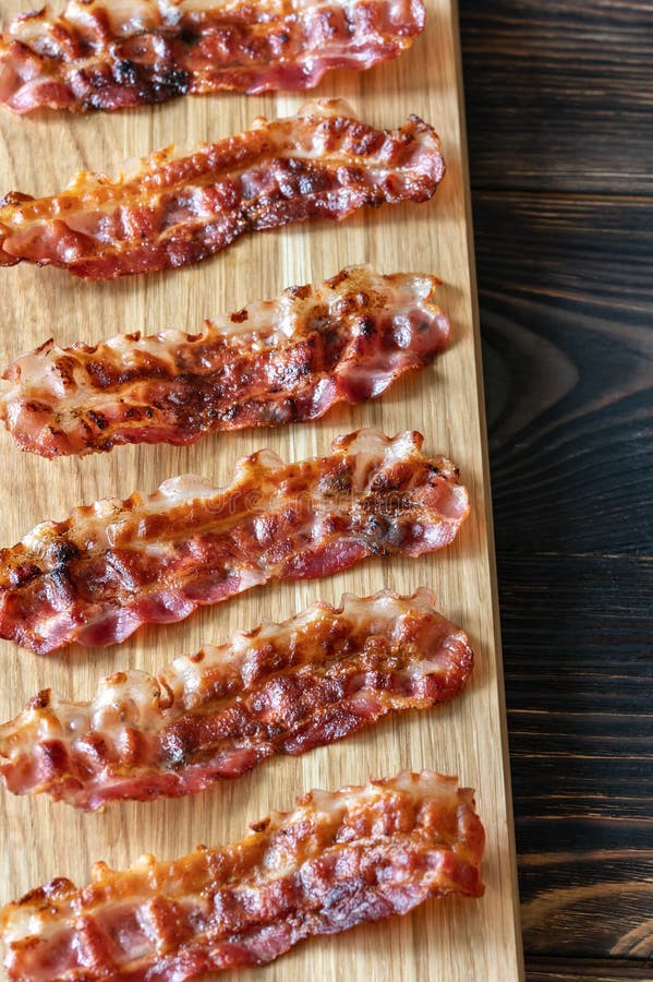 Fried bacon strips stock image. Image of meat, bunch - 181084409