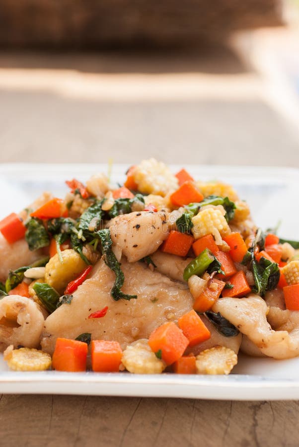 Fried Basil Leave with Pangasius Hypopthalmus Stock Photo - Image of ...