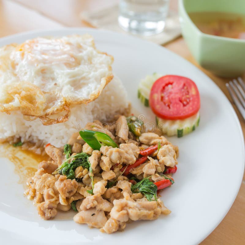 Fried Basil Leave with Pork and Fried Egg Stock Photo - Image of basil ...