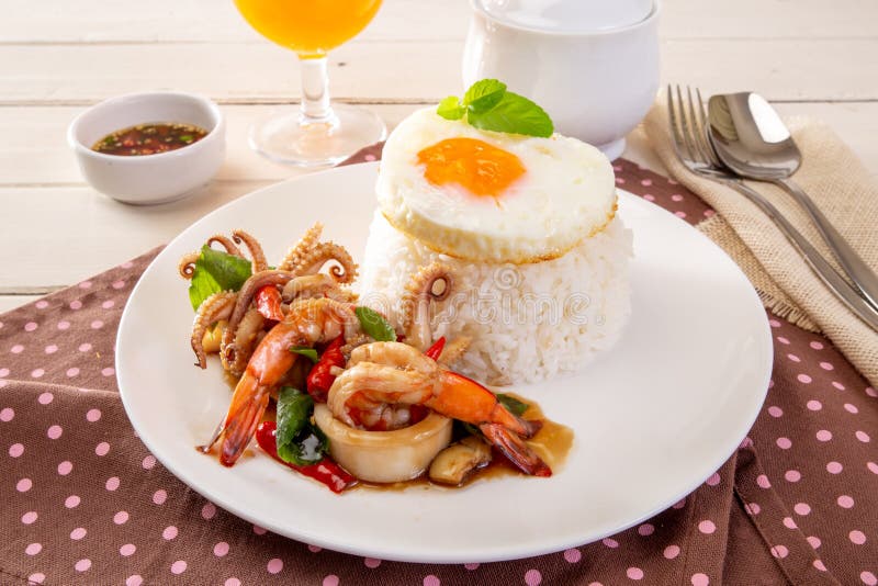 Fried Basil with Seafood stock image. Image of restaurant - 244099985