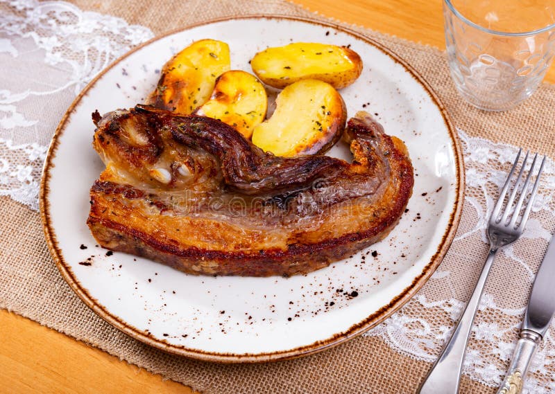Fried Beef Meat Served with Fried Potato Served at Plate Stock Image ...