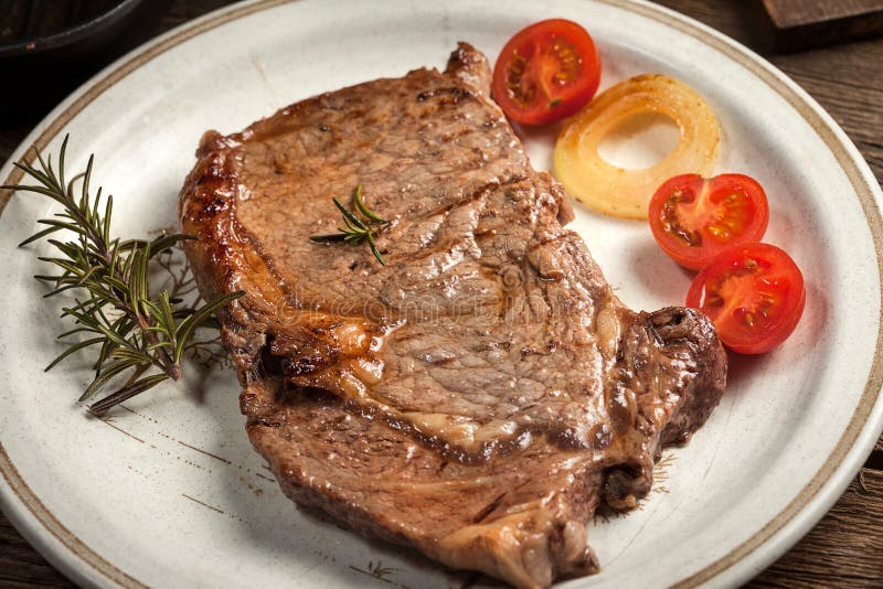 Fried beef steak. stock photo. Image of standing, plate - 58698076