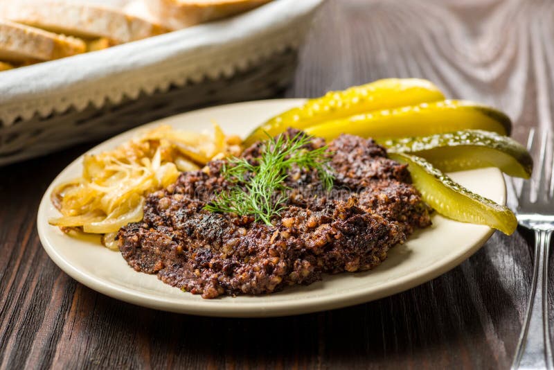 Fried Black Pudding with Additions and Bread Stock Image - Image of ...