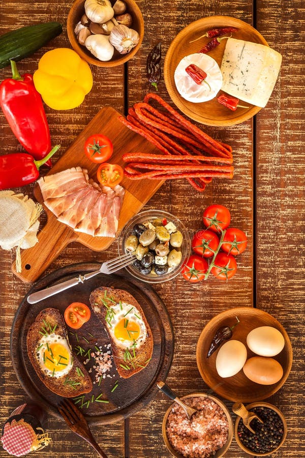 Fried Bread with Egg and Bacon. Hearty Meal. Vegetables and Fried Egg ...