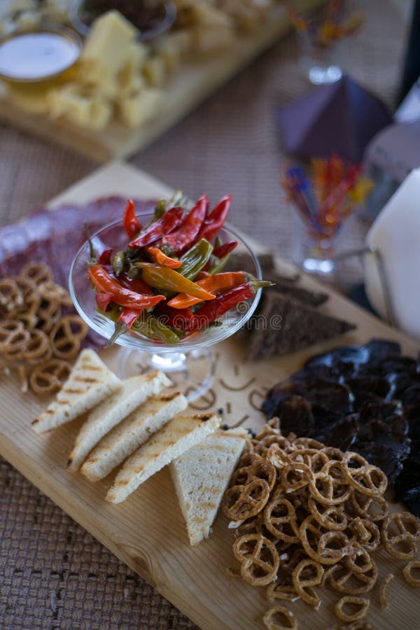 Fried Bread, Snacks, Hot Pepper on a Wooden Board Stock Photo - Image ...