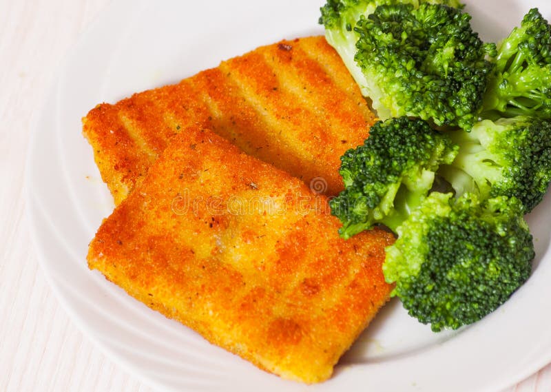 Fried Breaded Fish Fillets with Broccoli Stock Photo - Image of haddock ...