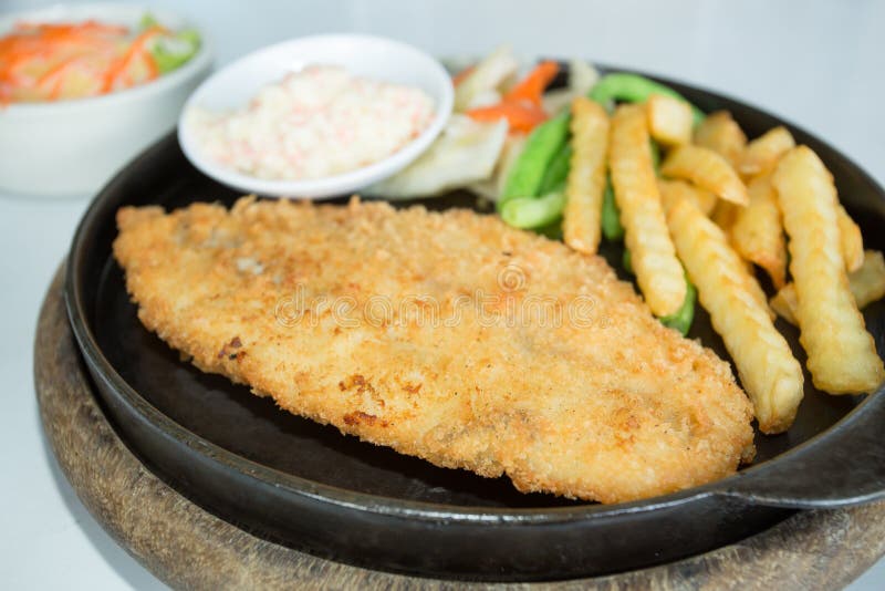 Fried breaded fish steak stock image. Image of seafood - 42583003
