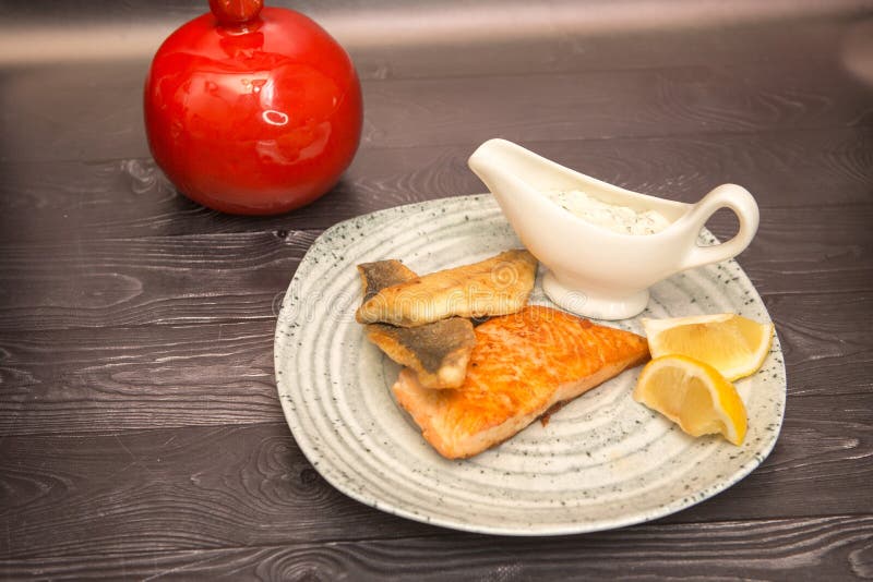 Fried Breaded Fish with White Sauce and Lemon Stock Image - Image of ...