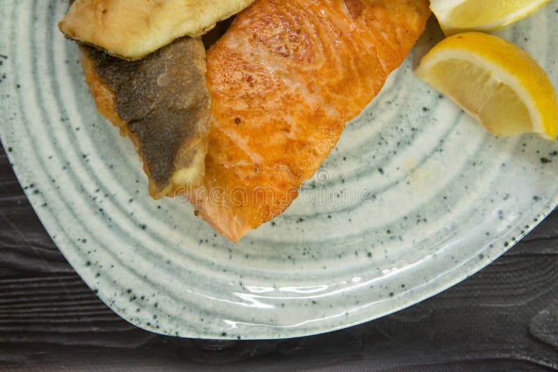 Fried Breaded Fish with White Sauce and Lemon Stock Photo - Image of ...