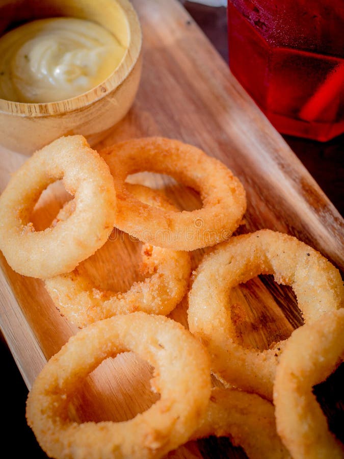 Fried breaded onion rings. stock image. Image of dish - 96496811