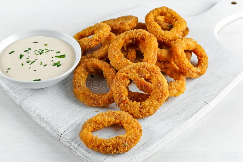 Fried Breaded Onion Rings with Sauce. on White Wooden Board, Background ...