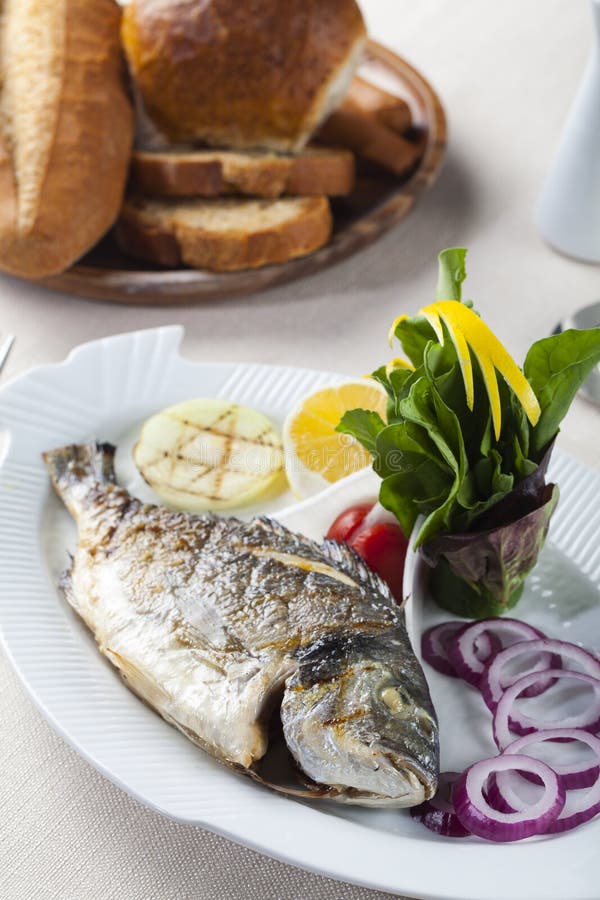 Roasted Dorado or Sea Bream Fish Stock Photo - Image of cooked, cooking ...