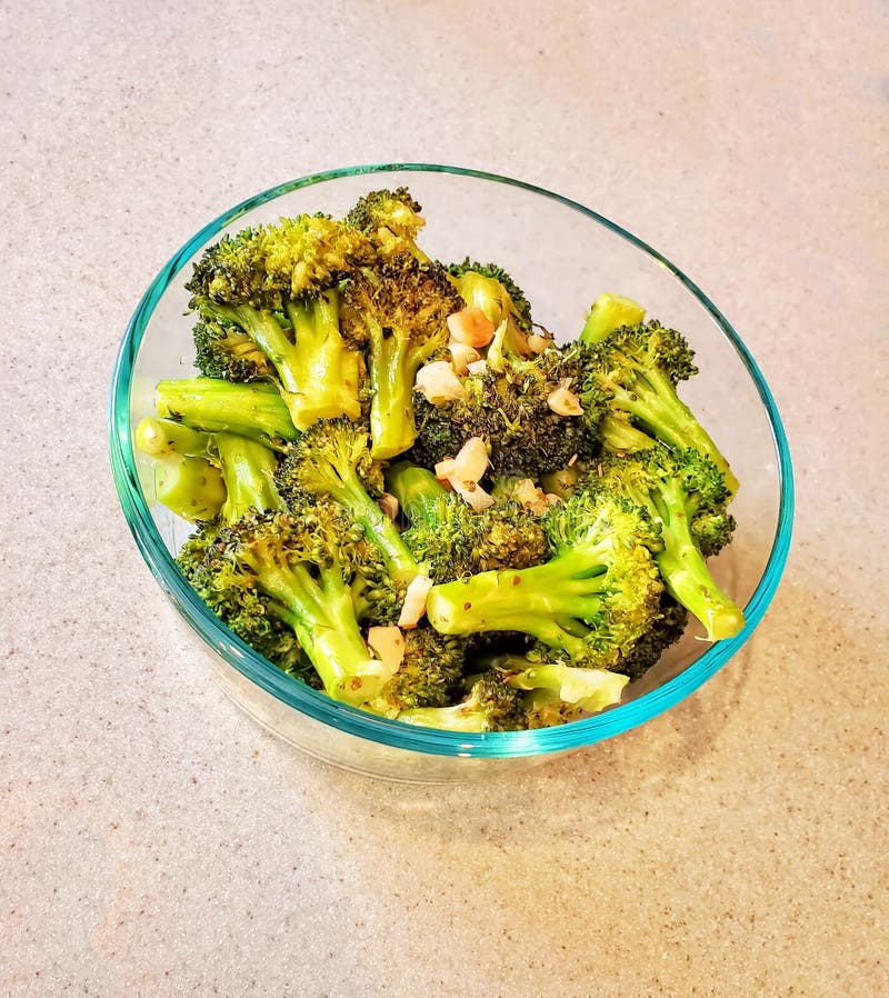 Fried Broccoli Florets Sitting in a Serving Bowl on a Kitchen Counter ...