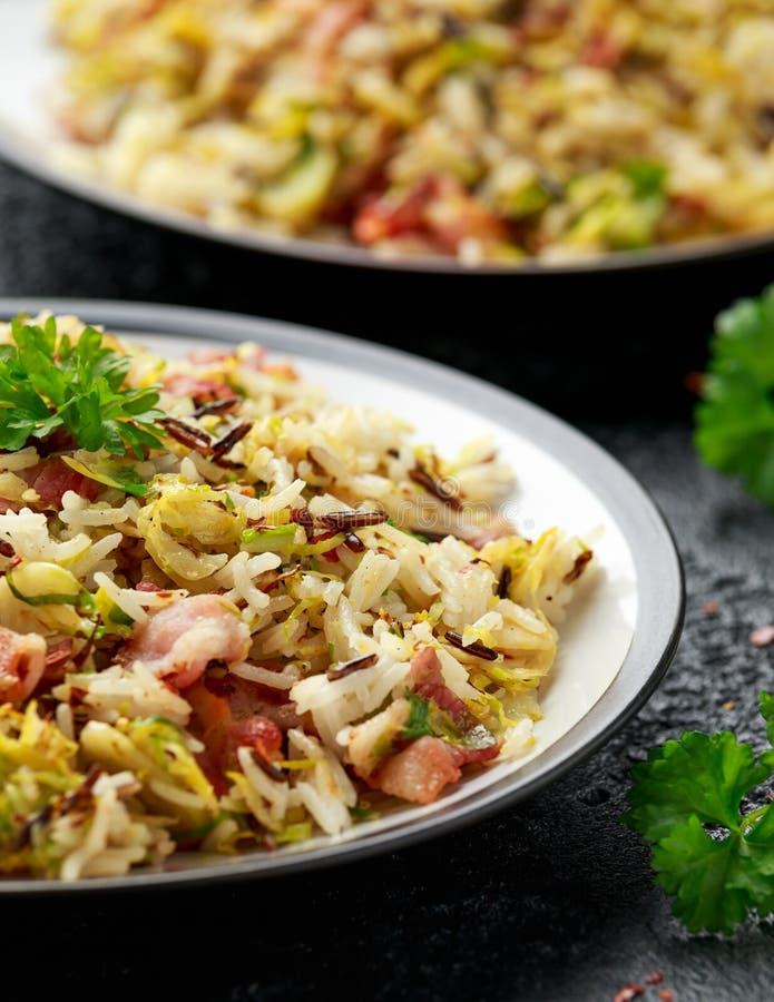 Fried Brussels Sprouts with Rice and Crispy Bacon Stock Image - Image ...