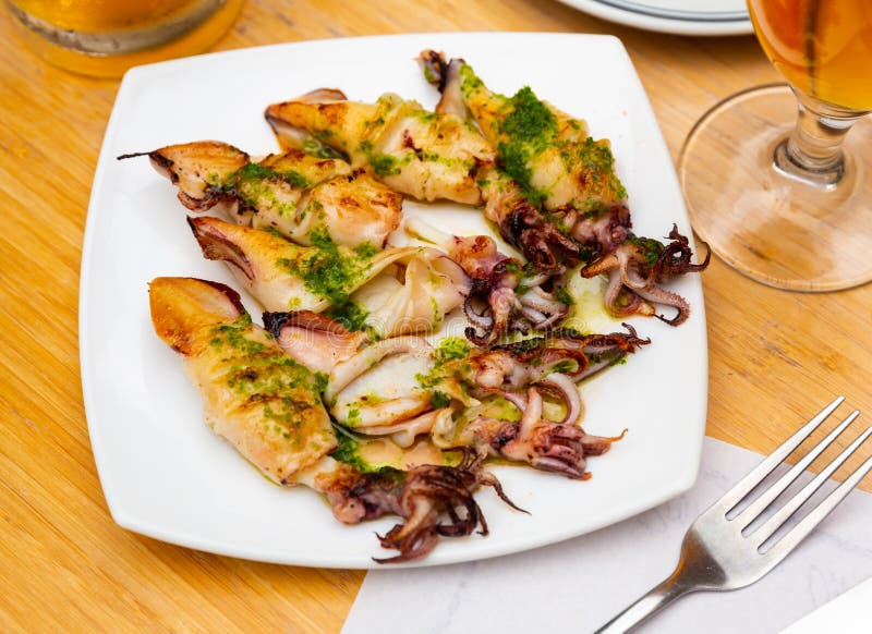 Fried Calamari with Pesto Sauce Served in a Plate Stock Photo - Image ...